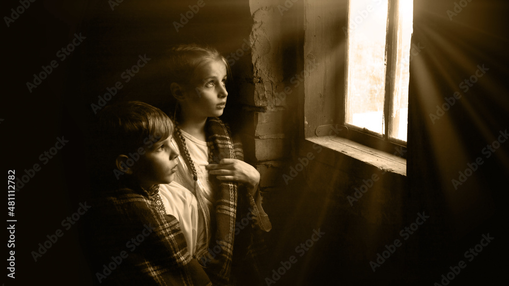 Children stand at the window Stock Photo | Adobe Stock