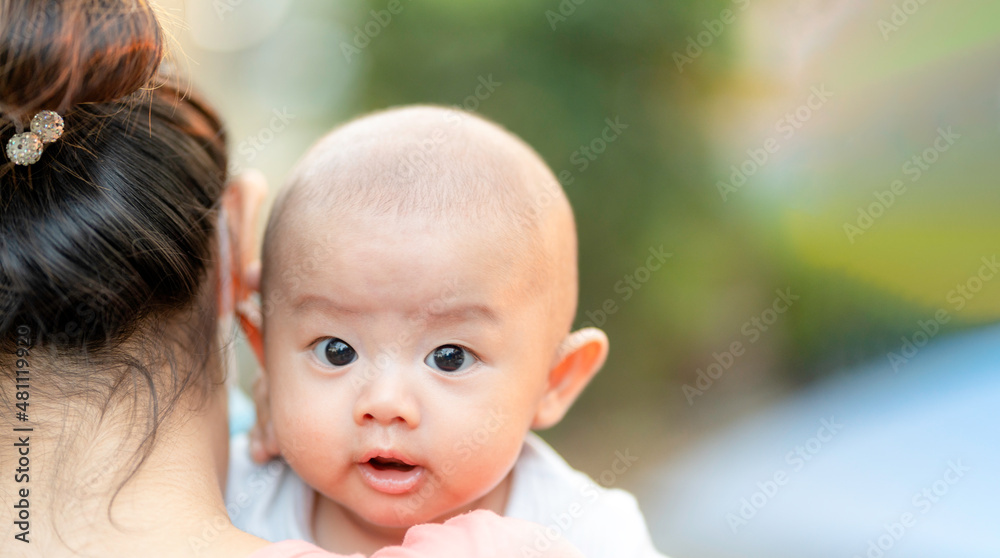 Cute, newborn Asian baby boy. Family happy, Asian young mother is ...