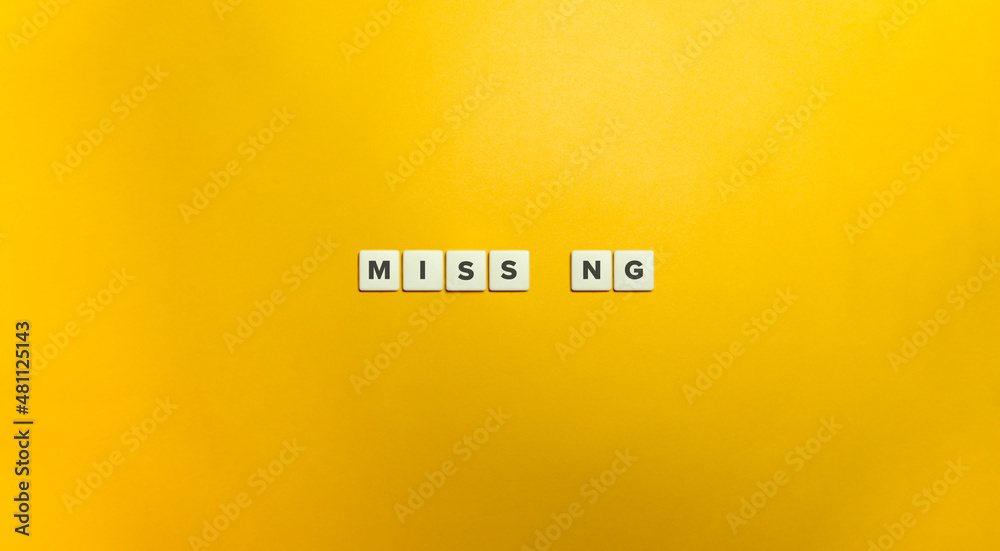 Missing Word and Banner. Letter Tiles on Yellow Background. Stock Photo ...