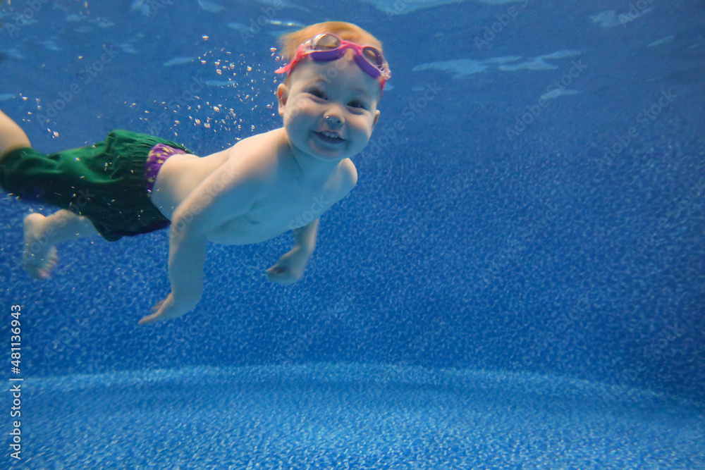 Underwater Baby swimming Stock Photo | Adobe Stock
