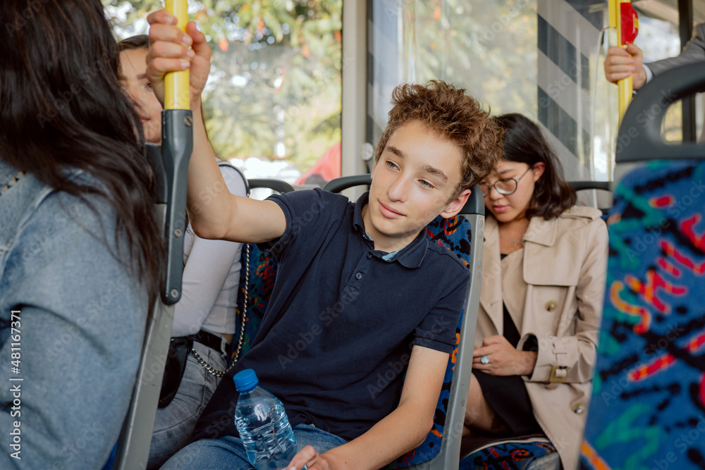 Crowd of people on bus afternoon in city traffic jams women sitting in ...