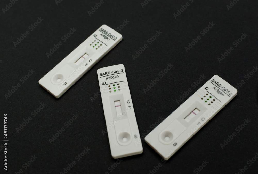 Negative corona rapid antigen tests on black background, copy space ...