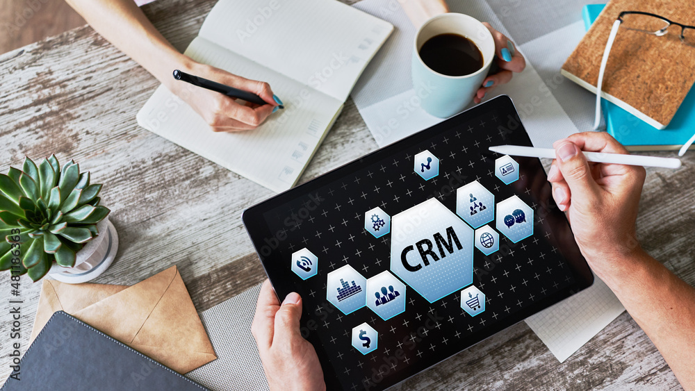 CRM - customer relationship management system concept on screen. Stock ...
