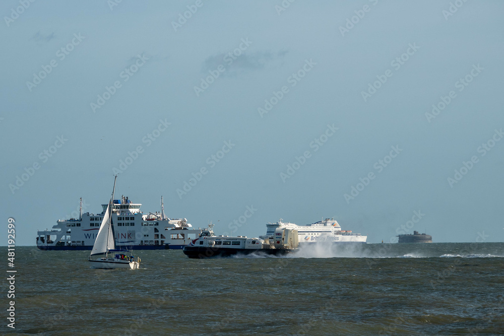 Photo hovercraft brittany ferry and wightlink ferry passing a fort in ...