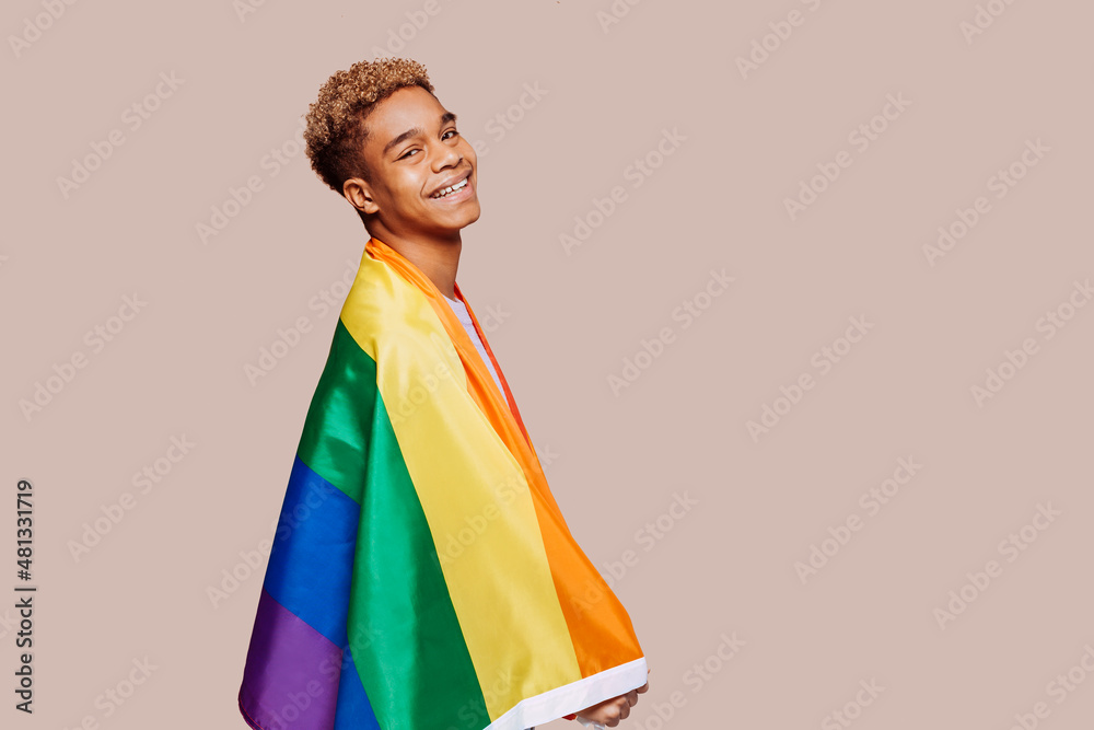 Side view portrait of cheerful young afro latin black man with a gay ...