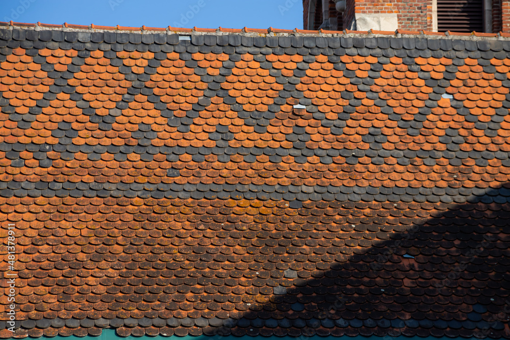 Seamless roof texture of flat red shingles with embedded line patterns ...