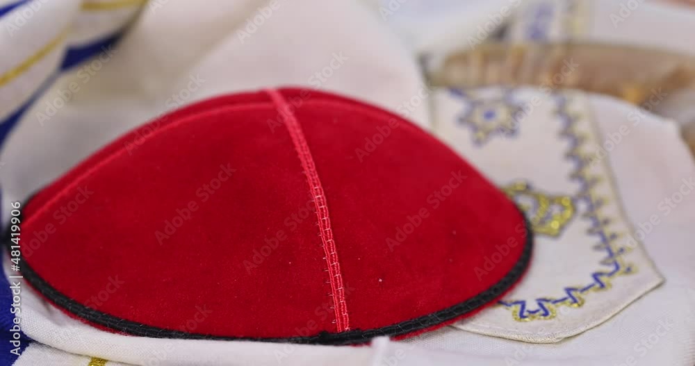 Jewish holidays, during prayer items kippa with prayer shawl tallit on ...