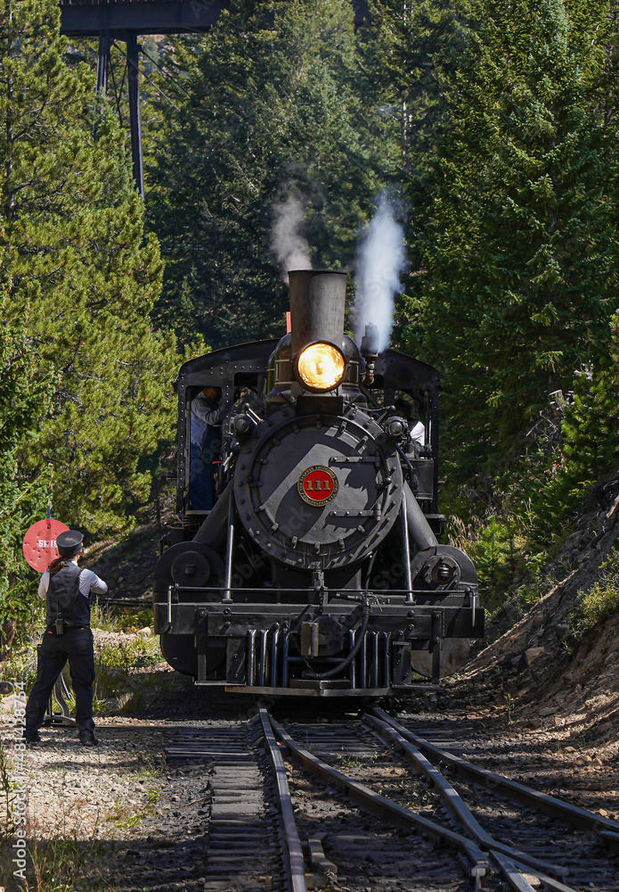 Georgetown, Colorado - 9-19-2021: A railroad conductor standing beside ...