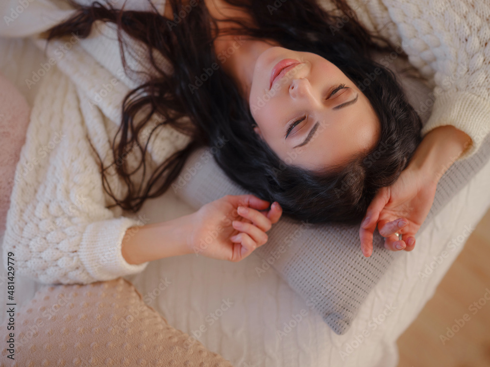 Lovely brunette woman posing in a bedroom. Good morning. Playful ...