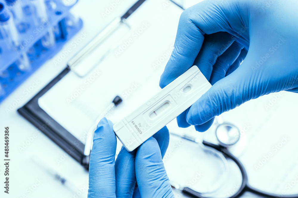 Sars test antigen coronavirus kit. Doctor holding rapid covid medical ...