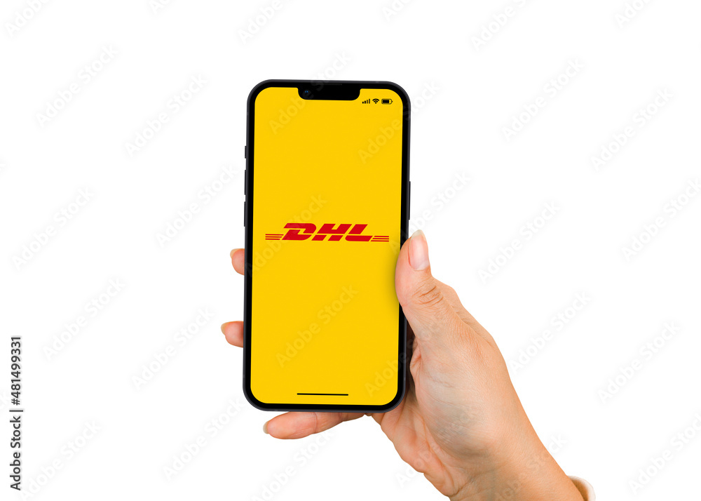 Female hand holding a smartphone iPhone 13 Pro with DHL International ...