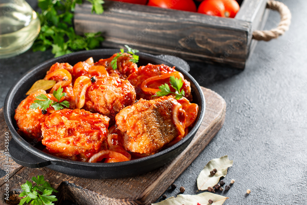 Traditional Brazilian fish stew moqueca baiana with fish filet in ...