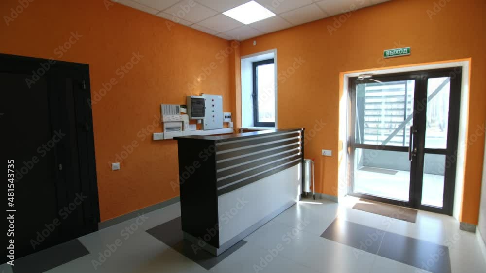 Reception desk for concierge and switchboards set in stylish spacious ...