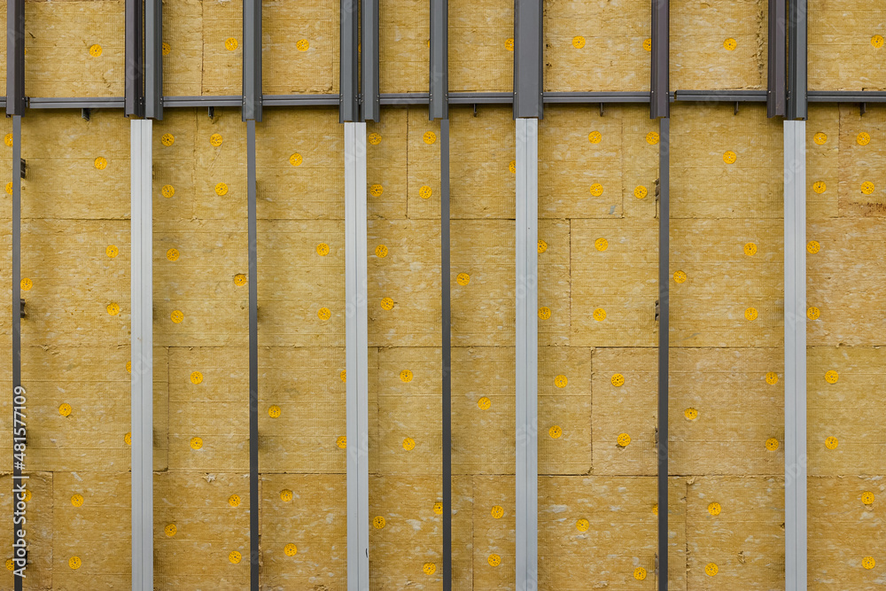 Metal profiles of the hinged facade fastening system. Front view ...