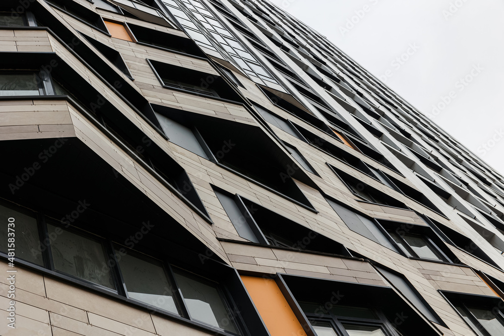 The exterior wall of a contemporary commercial style building with ...