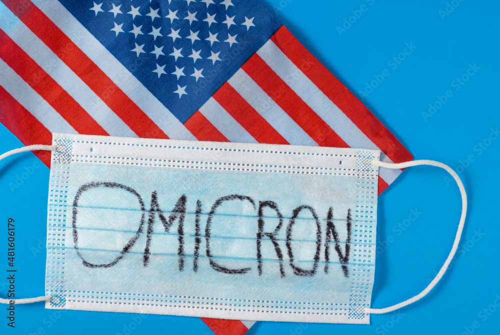 The flag of the United States of America and a medical mask with ...
