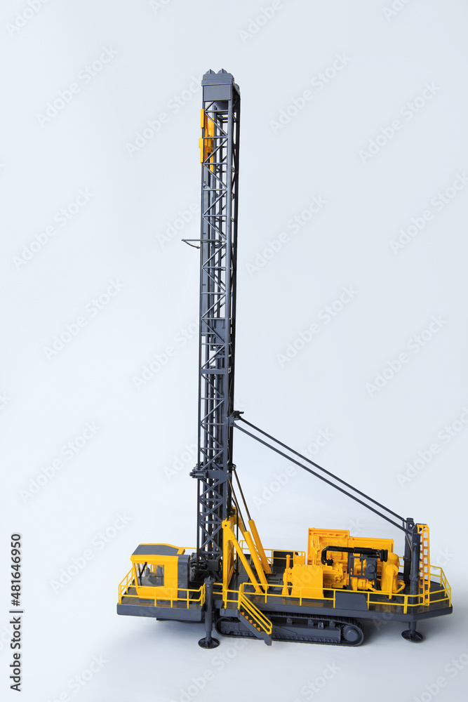 Large drill rig for drilling boreholes for explosives on a white background. Technologies of ...
