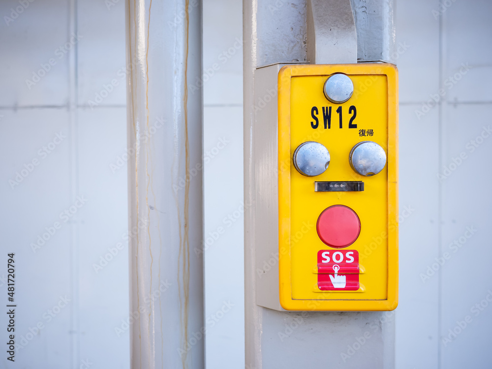 sos emergency button on the platform of train station in japan Stock ...
