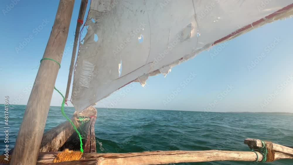Old traditional maritime traditional vessel Dhow boat sailing under ...