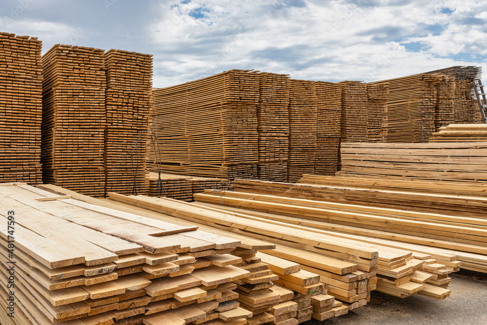 Industrial production of finished lumber products stacked in stacks on ...