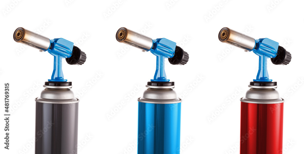 Hand burner (blowtorch), on a gas cylinder of different colors. Set of ...