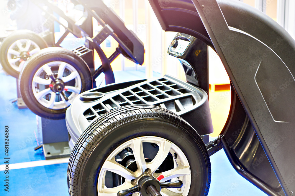 Stands for balancing wheels of car Stock Photo | Adobe Stock