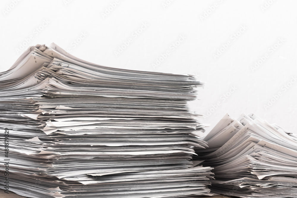 bundles bales of paper documents. stacks packs pile on the desk in the ...