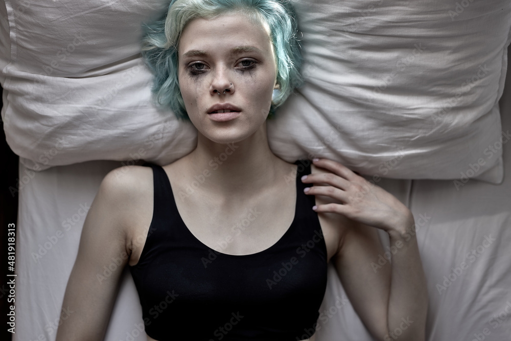 Depression Concept. top view on upset caucasian woman crying, lying in ...