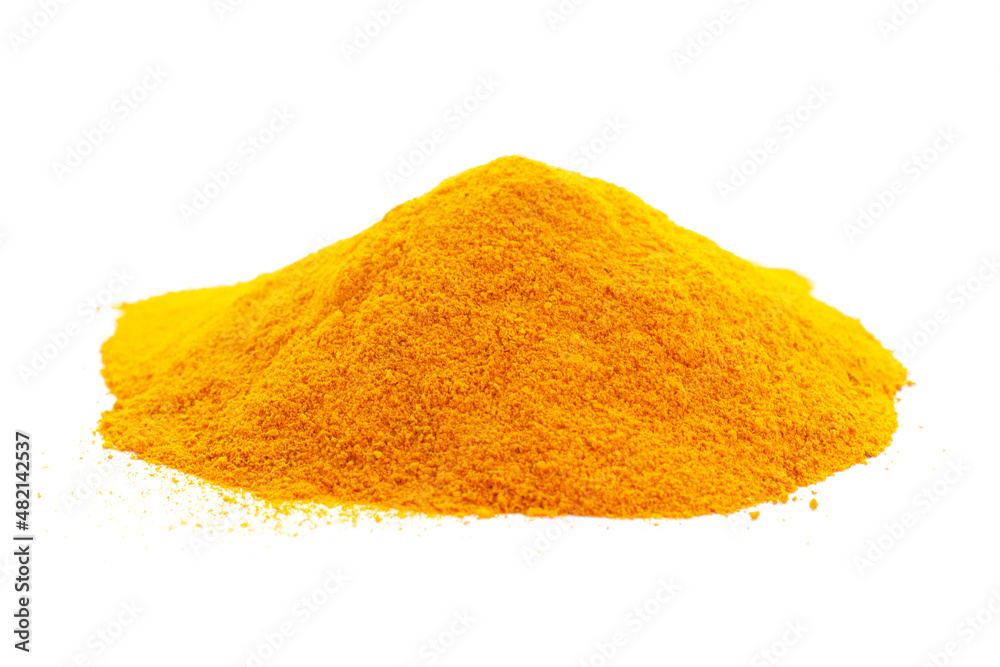 Heap of turmeric powder isolated on white background, close-up. Yellow ...