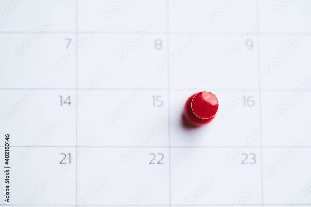 Red pin lace to white calendar with copy space for appointment plan ...