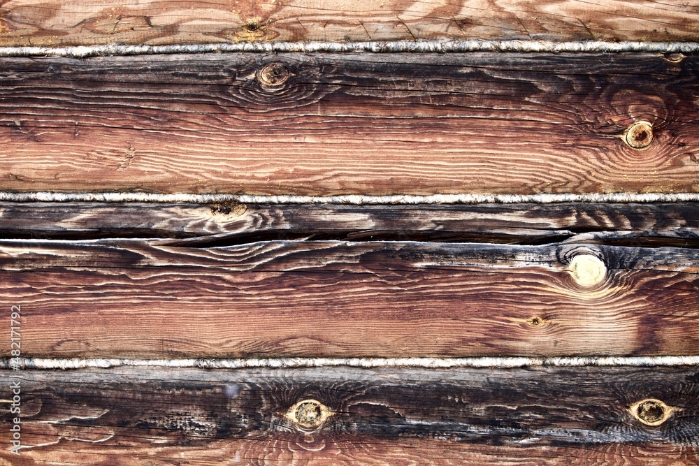 weathered surface of the old wooden log house wall close-up. log walls ...