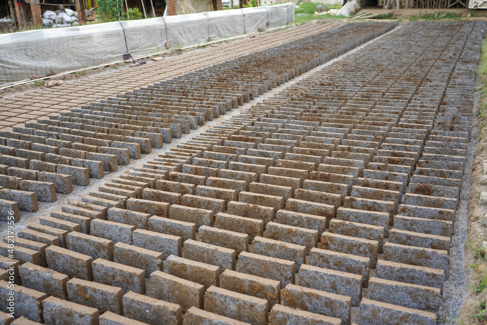 Making bricks from clay. After the clay is molded into bricks, after ...