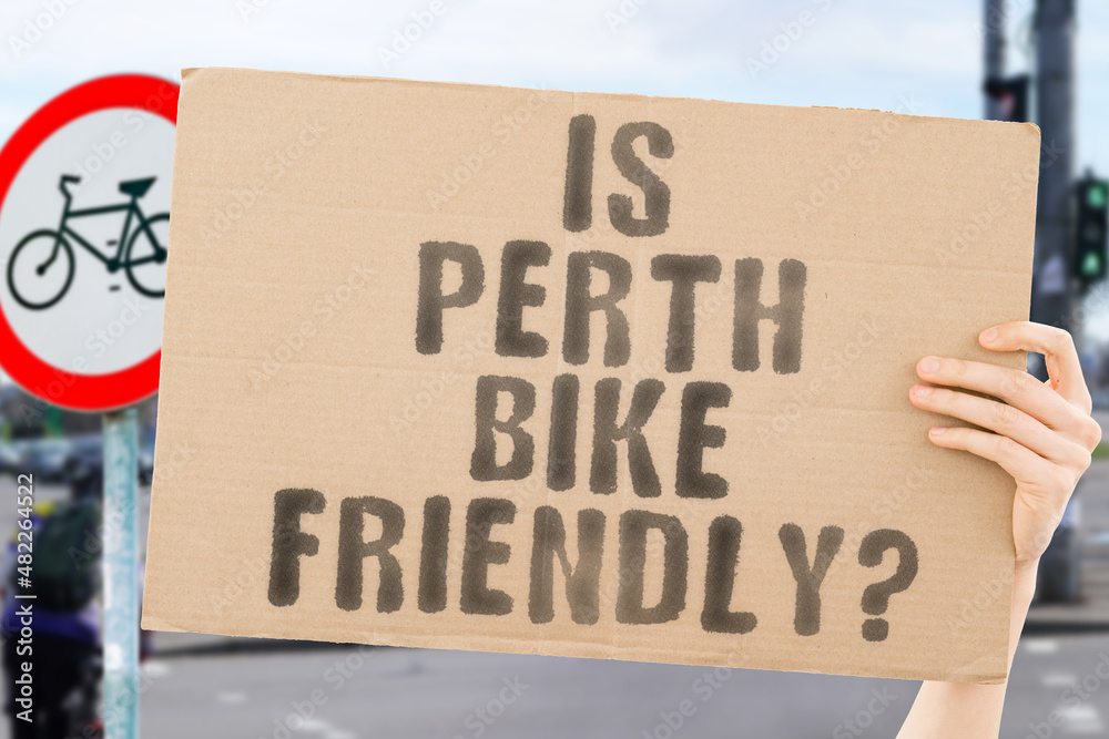 The question " Is Perth bike friendly? " on a banner in men's hand with ...