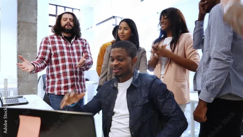 group of workers of different races, cultures and ages lamenting a ...