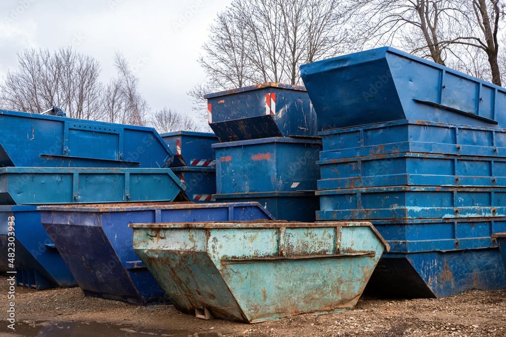 Blue metal scrap container on the street Stock Photo | Adobe Stock