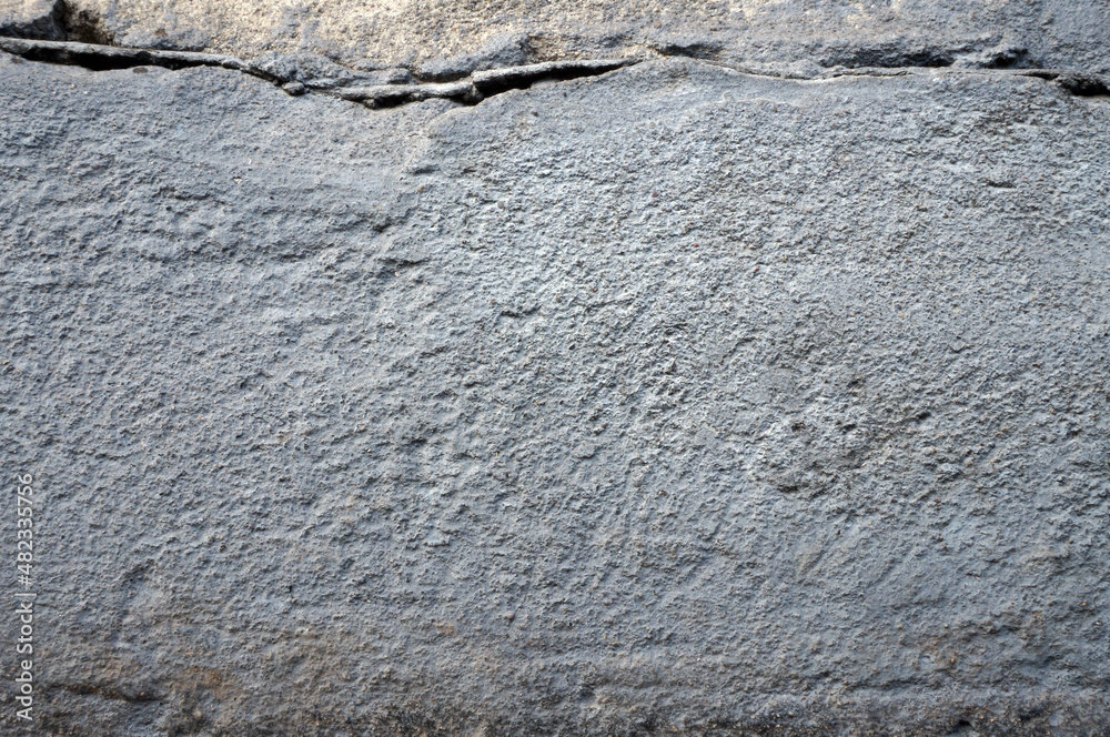 The concrete base of the house, the foundation is gray. A large ...