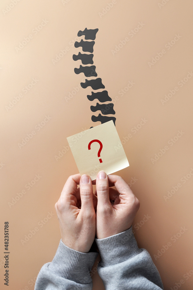 The question mark and the silhouette of the spine. The symbol of the ...