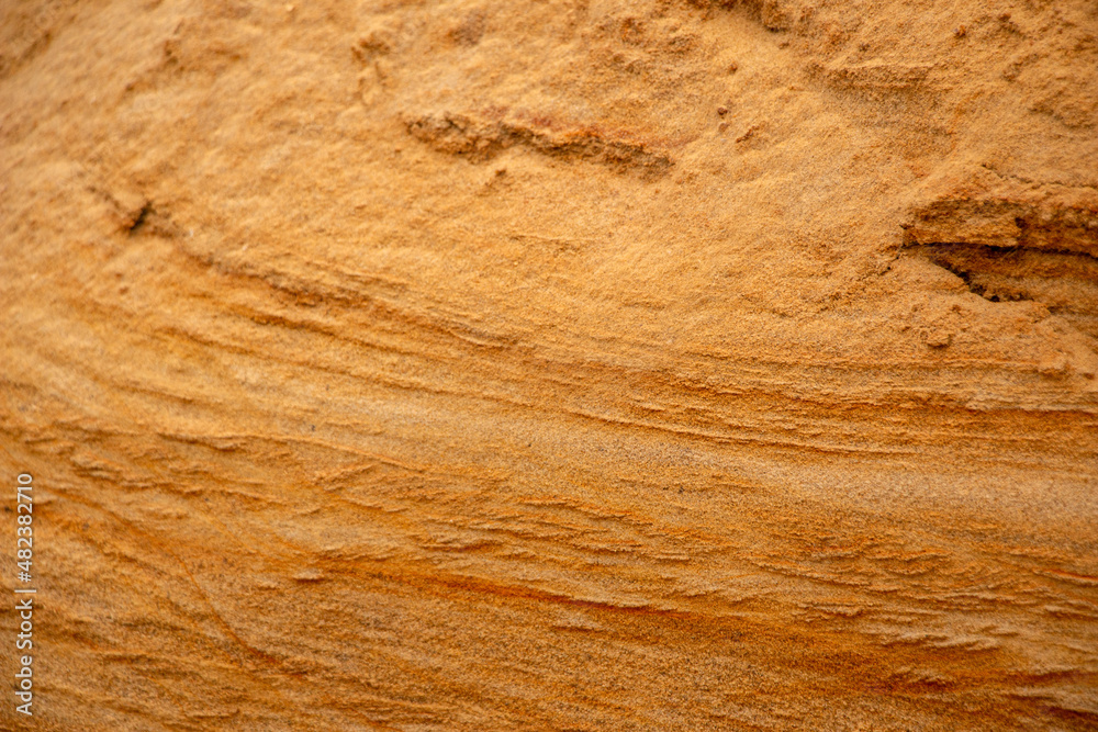 Textural sand, with relief surface, multi-colored layers and different ...