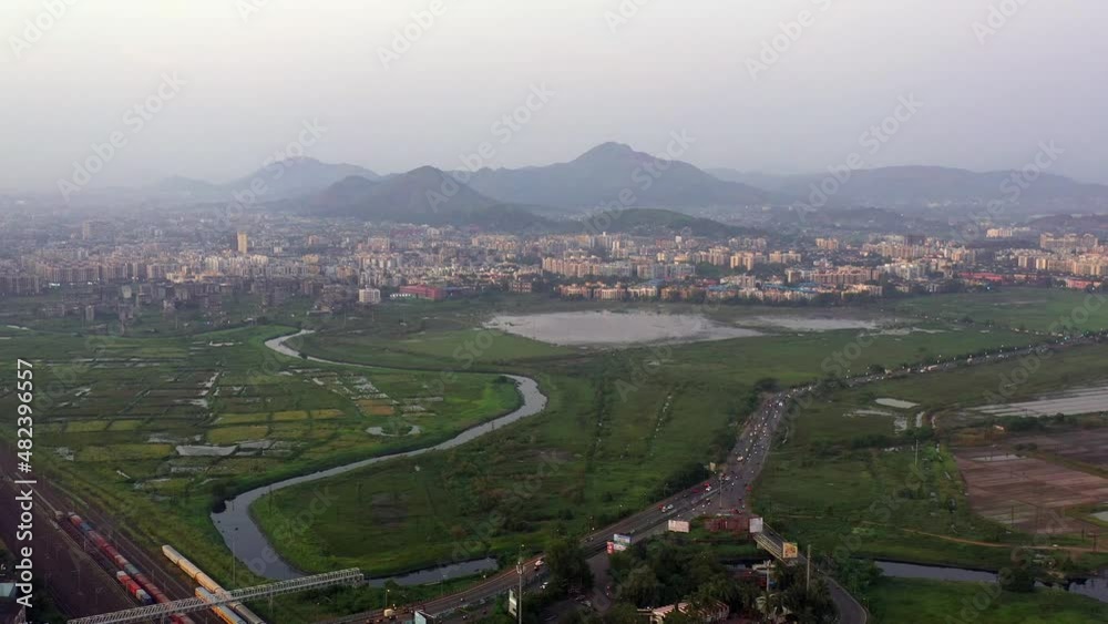 Suburban Area Of Vasai With Buildings, Train Station, Highways And ...