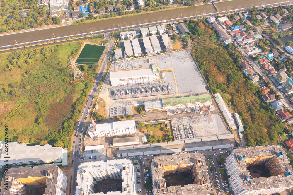 Aerial view of electricity generating, voltage poles. Power lines on ...
