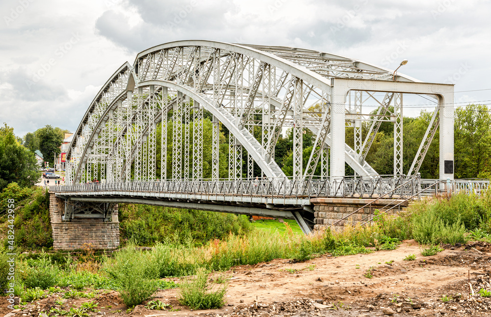 Steel arch bridge across the Msta river Stock Photo | Adobe Stock