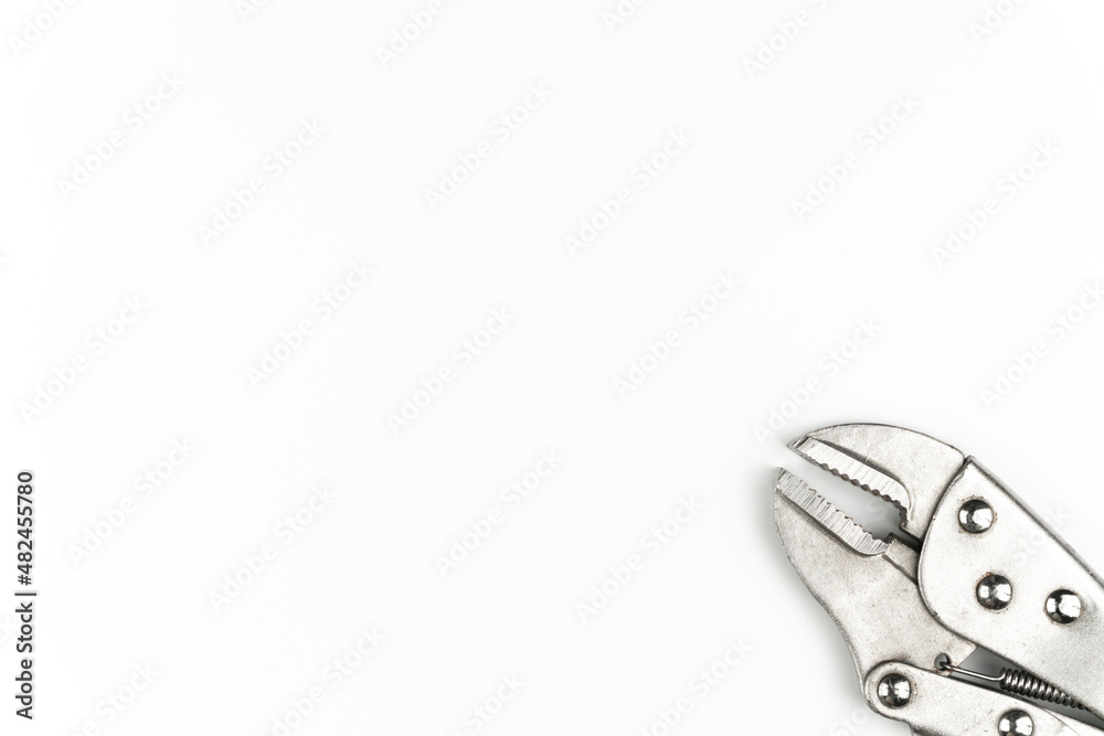 Worktable top view of craftsman tool background with a locking pliers ...