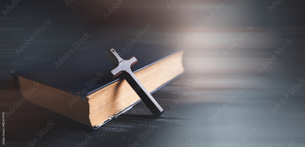 open book and cross on the table Stock Photo | Adobe Stock
