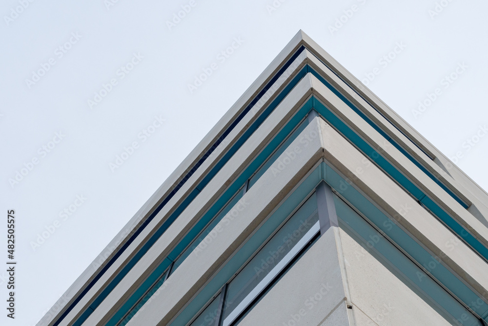 The exterior wall of a contemporary commercial style building with ...