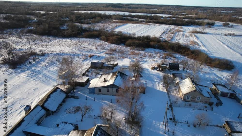 Country houses in the countryside in winter season. Aerial view of ...