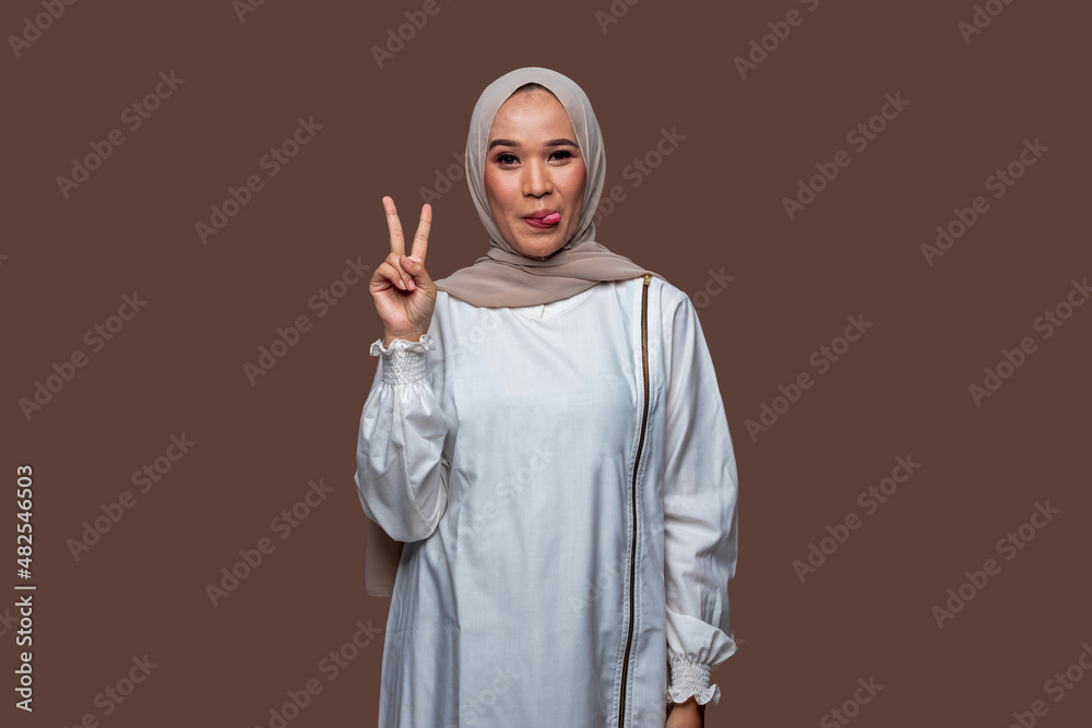 Beautiful hijab women with peaceful hand gestures isolated on plain ...