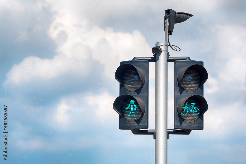Green bicycle and pedestrian traffic lights. Green traffic light for ...