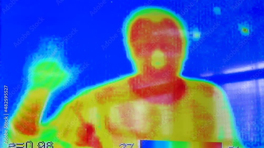 Thermal Imaging Translating Video on Television. Infrared Thermal Male ...