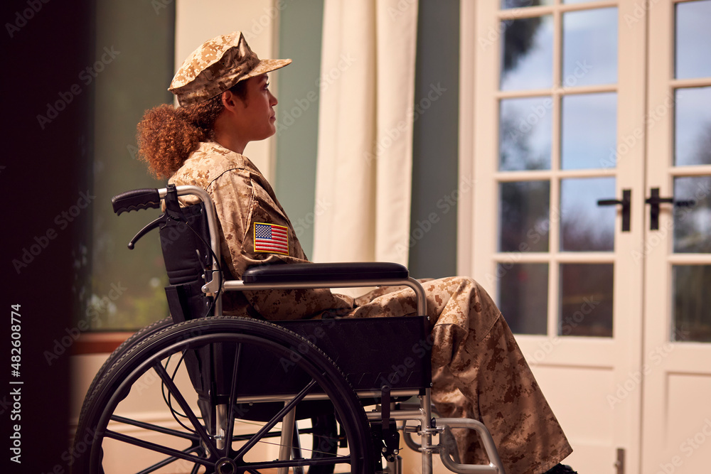 Injured Female American Soldier Wearing Uniform Sitting In Wheelchair ...