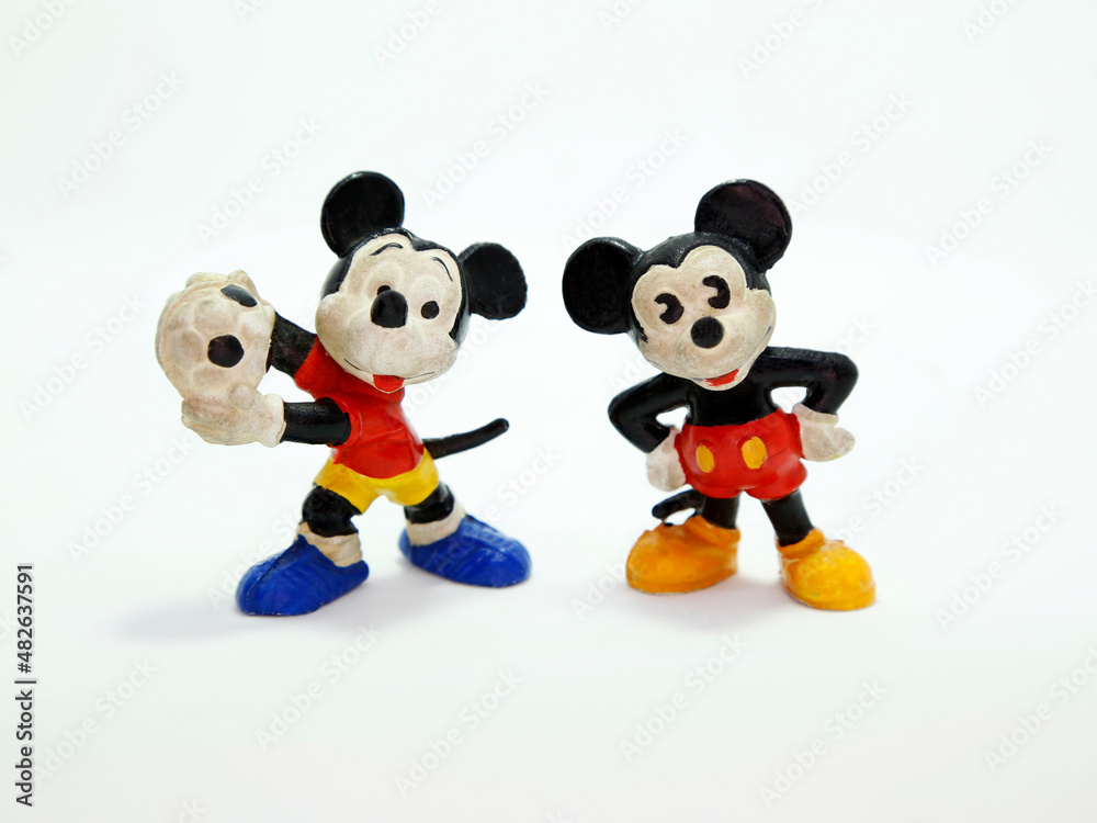 Young Mickey playing soccer. Mickey Mouse retro toy figure. Plastic ...